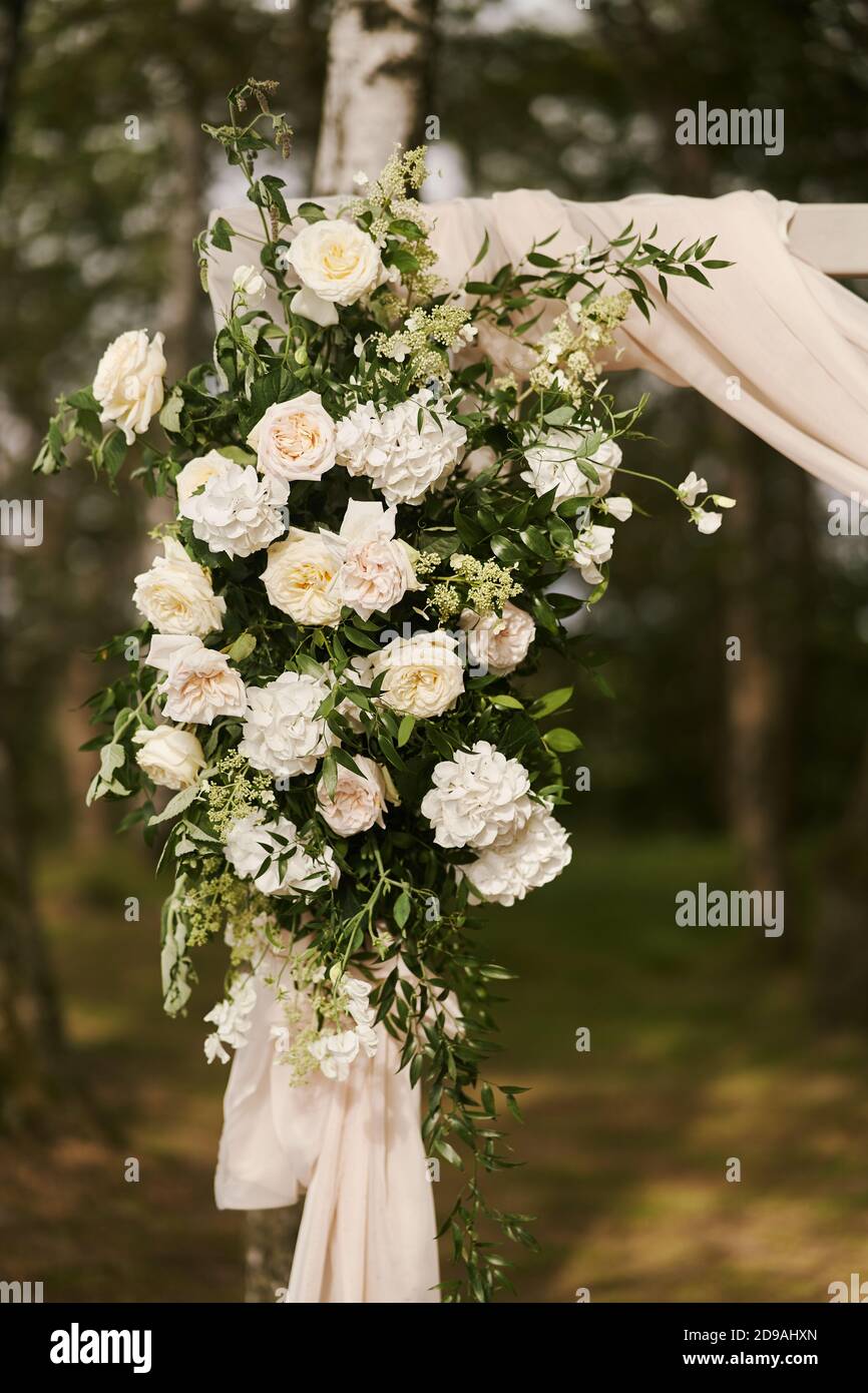 Wedding decorations. Flowers on the wedding arch. Decoration of a ...