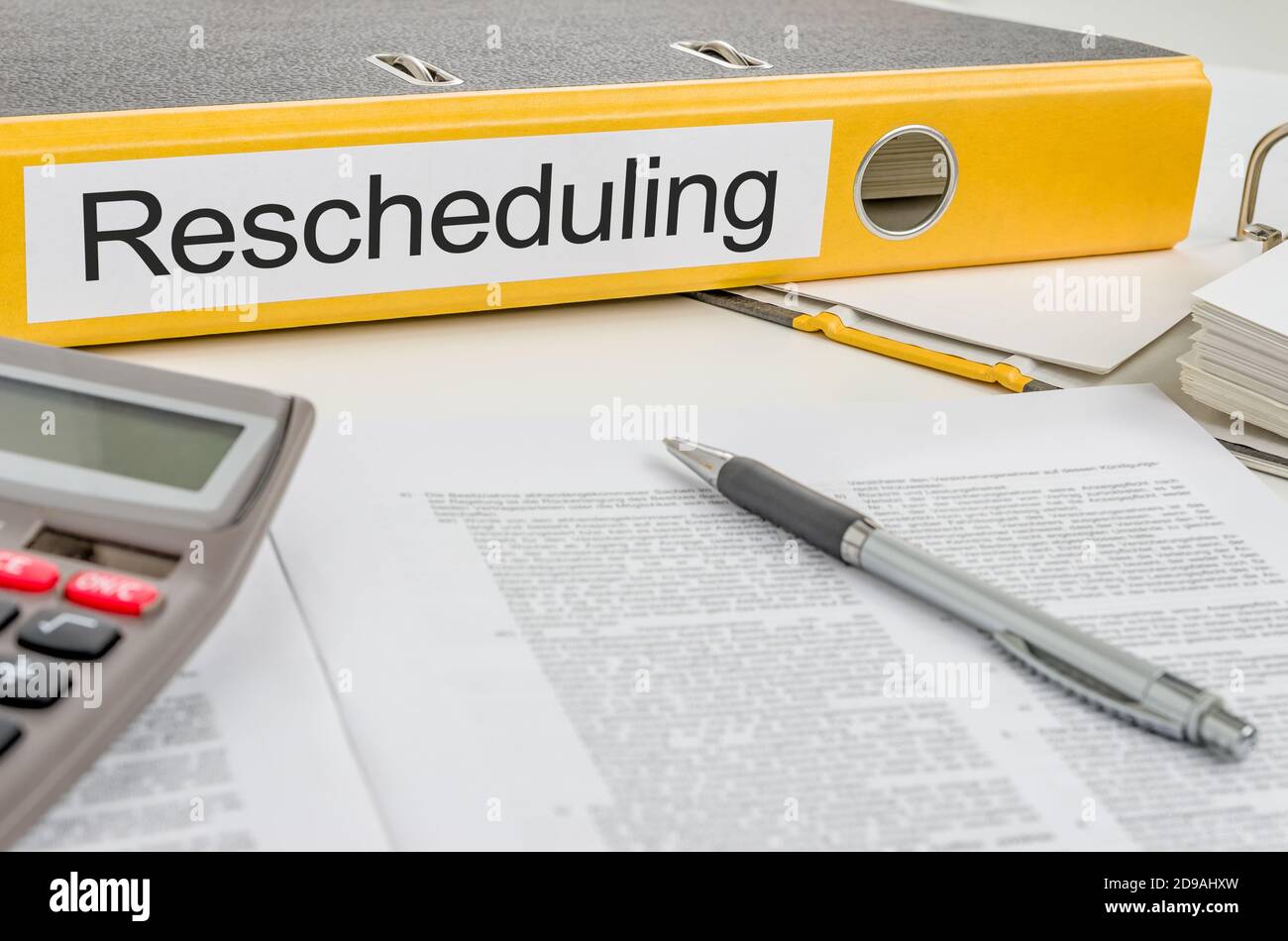 Folder with the label Rescheduling Stock Photo - Alamy