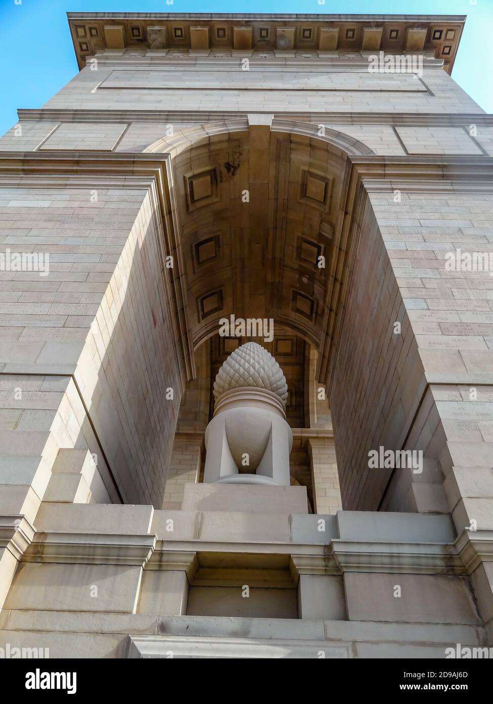 The India Gate is located in the center of New Delhi, the capital of ...