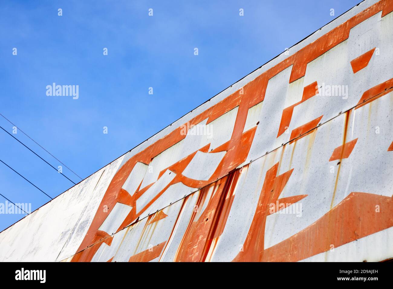 Painted metal sign, Japanese, on an old building; Tokyo, Japan Stock ...
