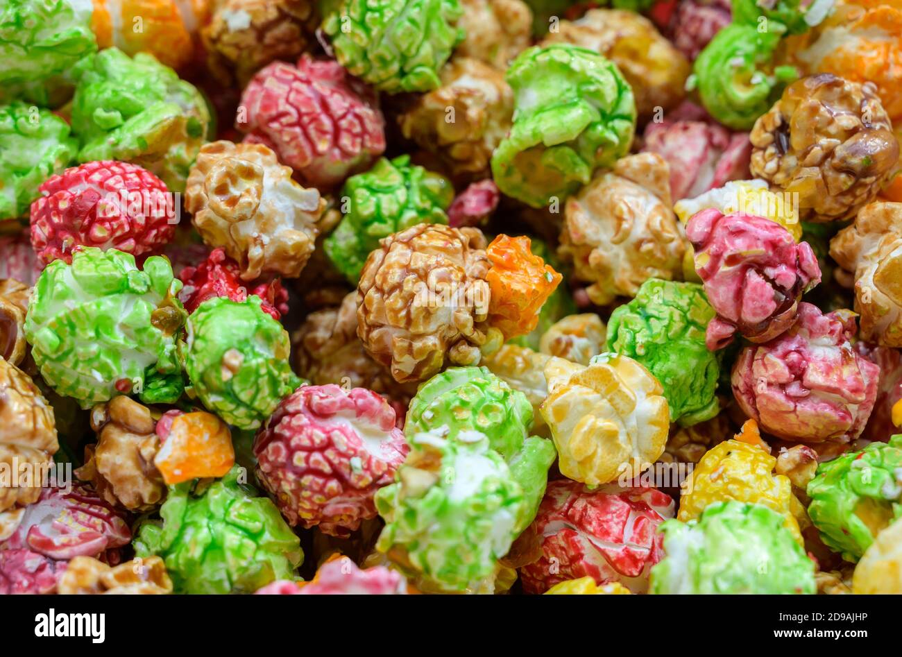 Colorful popcorn - food background. Selective focus Stock Photo - Alamy