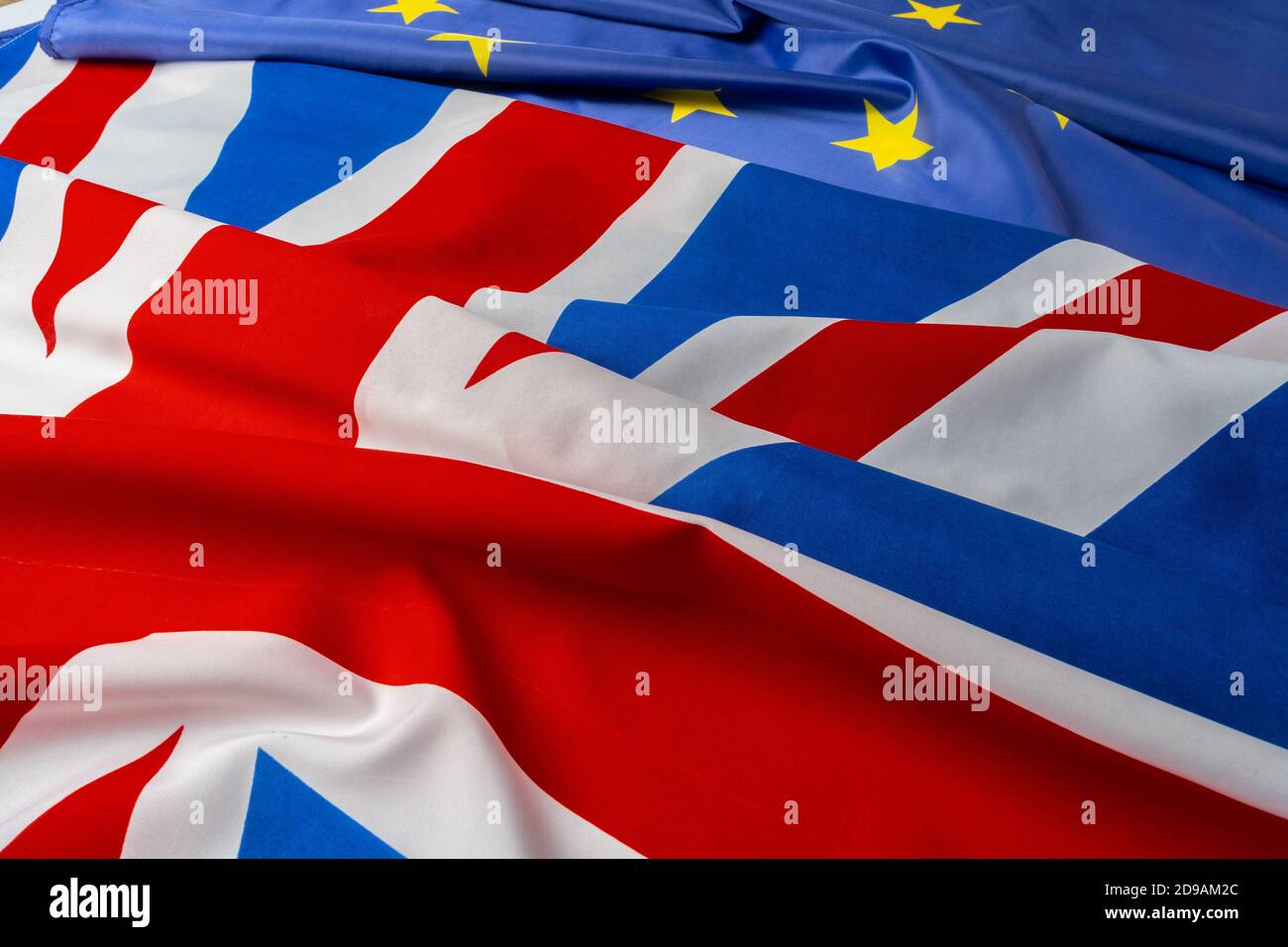 Flags of United Kingdom and European Union folded together Stock Photo ...