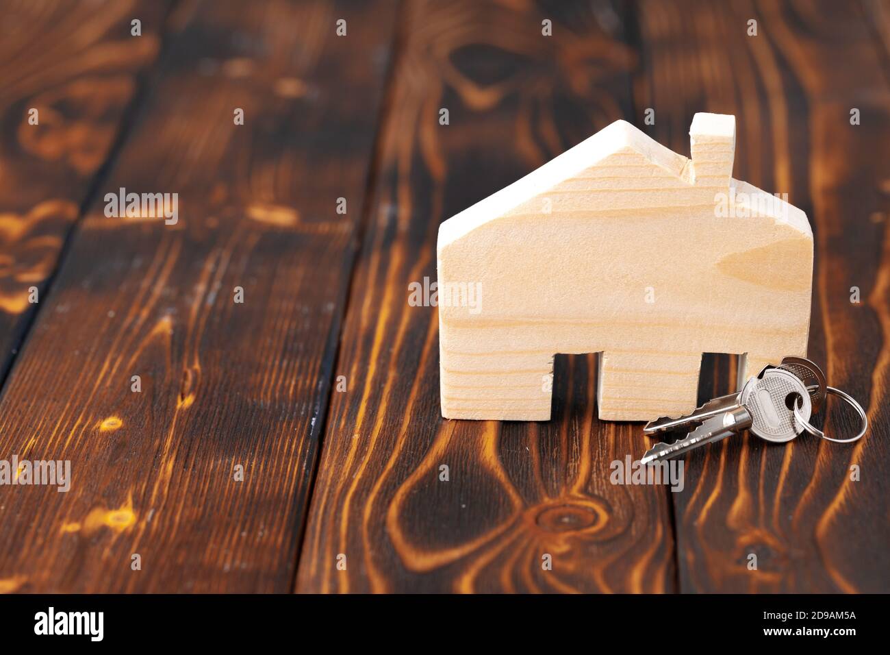 Wooden house model miniature and house keys Stock Photo - Alamy
