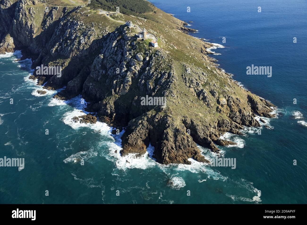 Spain, Galicia: aerial view of the lighthouse and the rock-bound ...