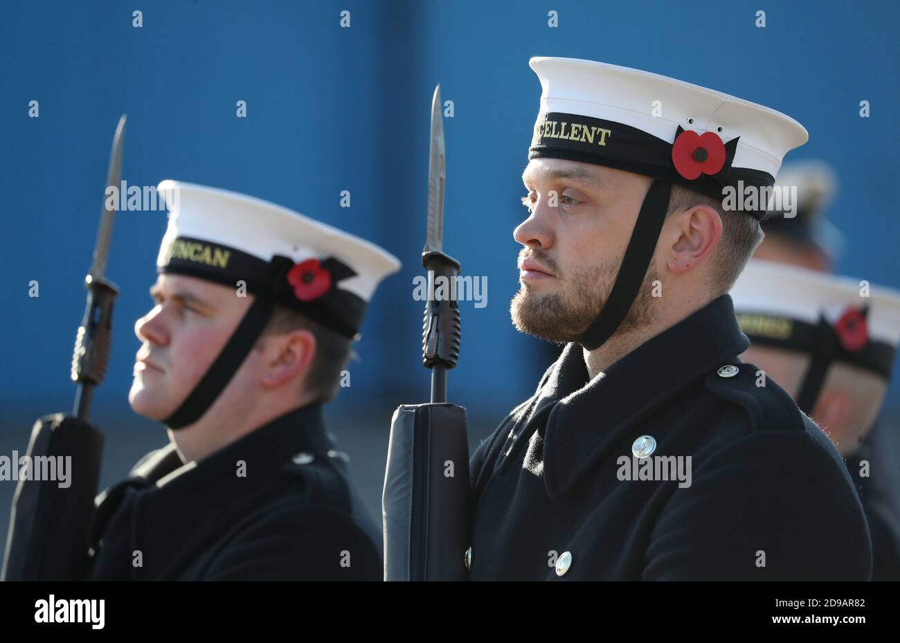 A view of poppies on the caps of Royal Navy ratings, as they take part ...