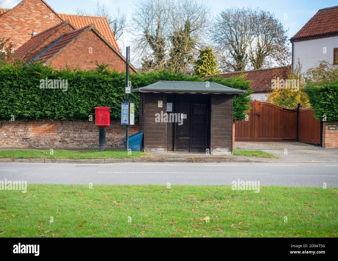 small enclosed village bus stop Stock Photo - Alamy