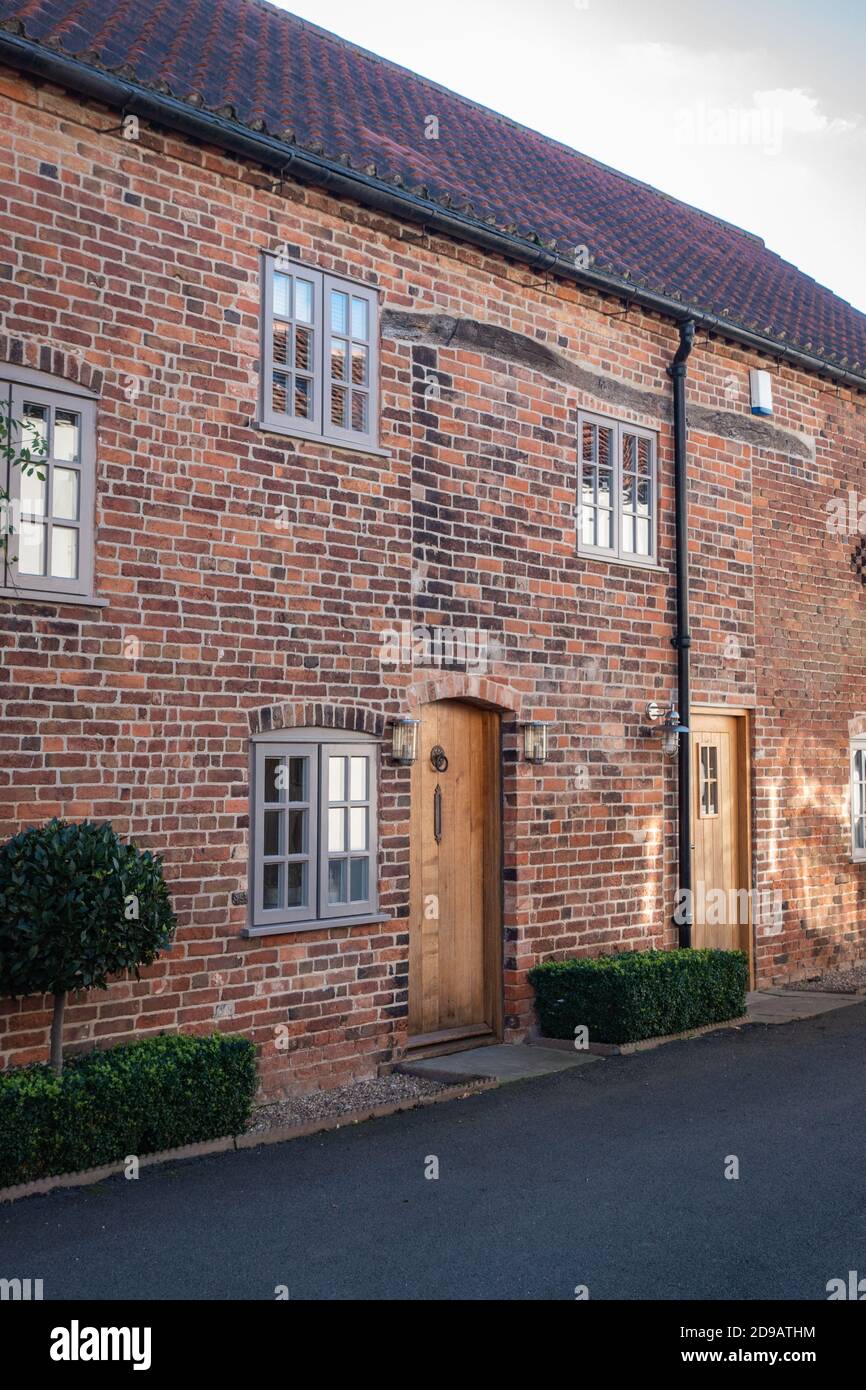 Terraced cottage in English village Stock Photo - Alamy