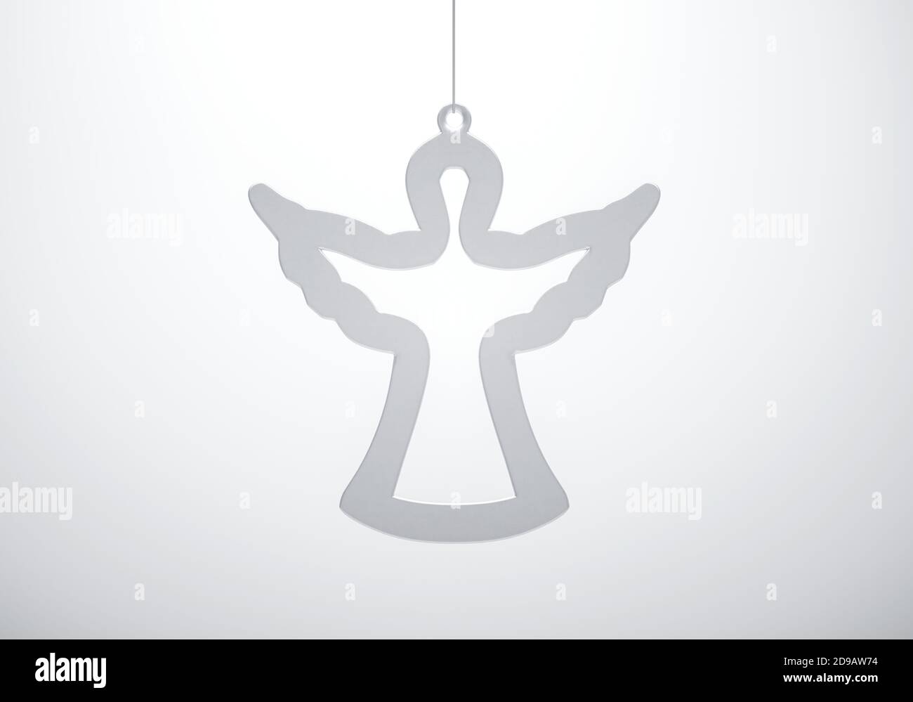 Glass angel contour Christmas ornament against white background ...