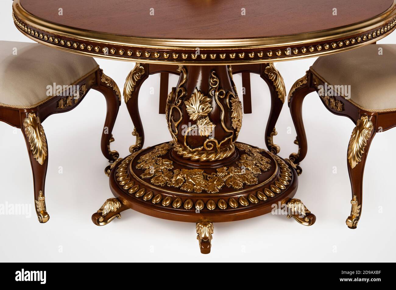Luxury gold plated kitchen table and chairs in baroque style Stock ...