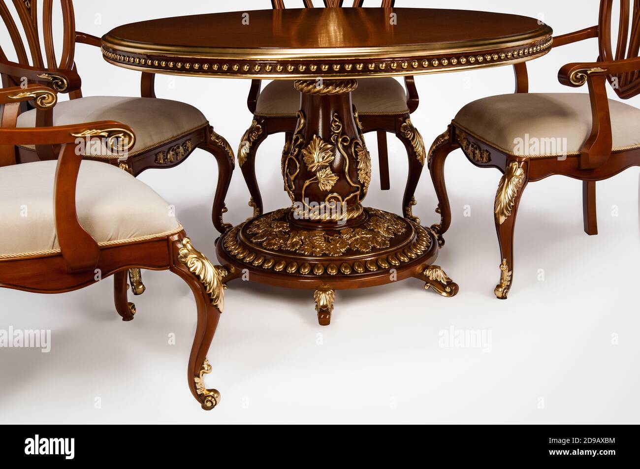 Luxury gold plated kitchen table and chairs in baroque style Stock ...