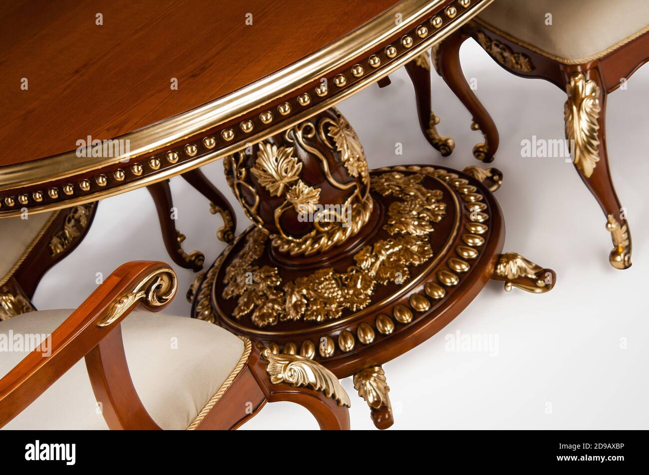 Luxury gold plated kitchen table and chairs in baroque style Stock ...