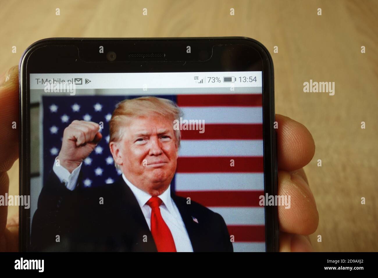 KONSKIE, POLAND - May 18, 2019: hand holding smartphone with photo of ...