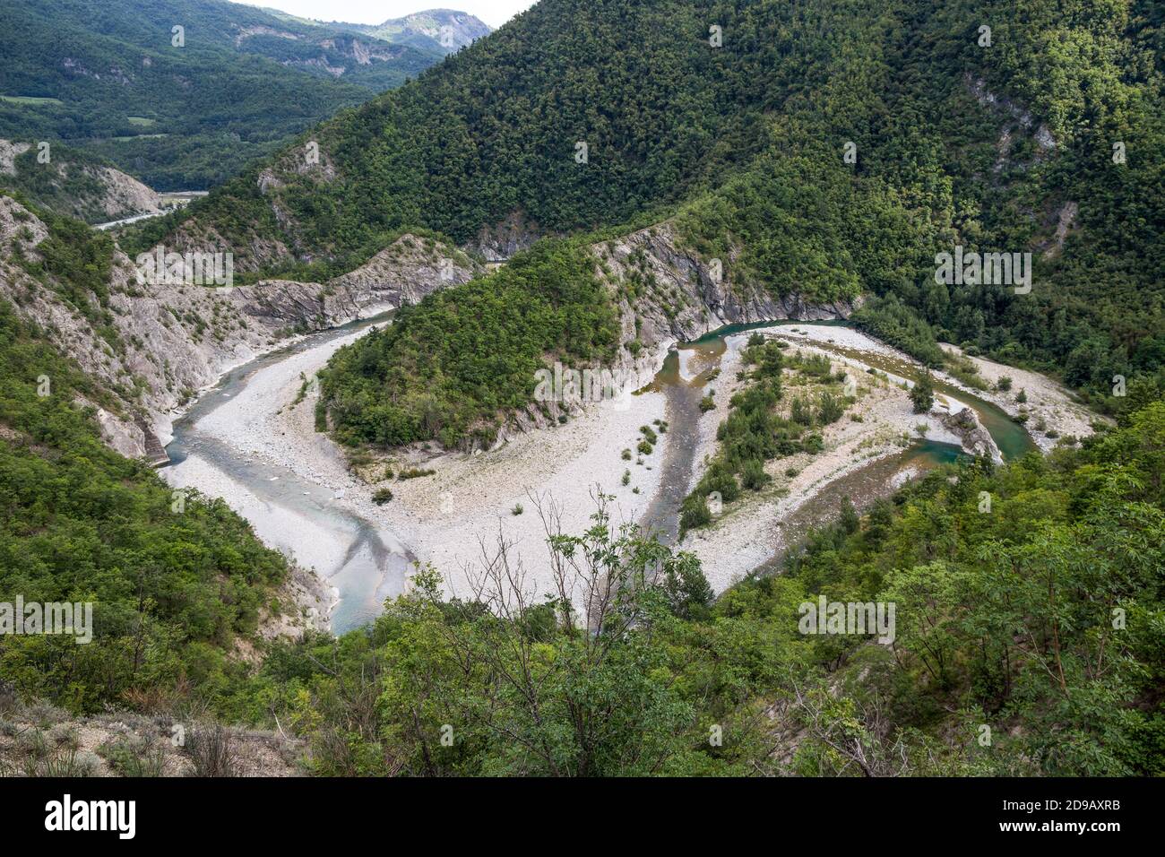 The river Trebbia and the surrounding hills during the summer, Emilia ...