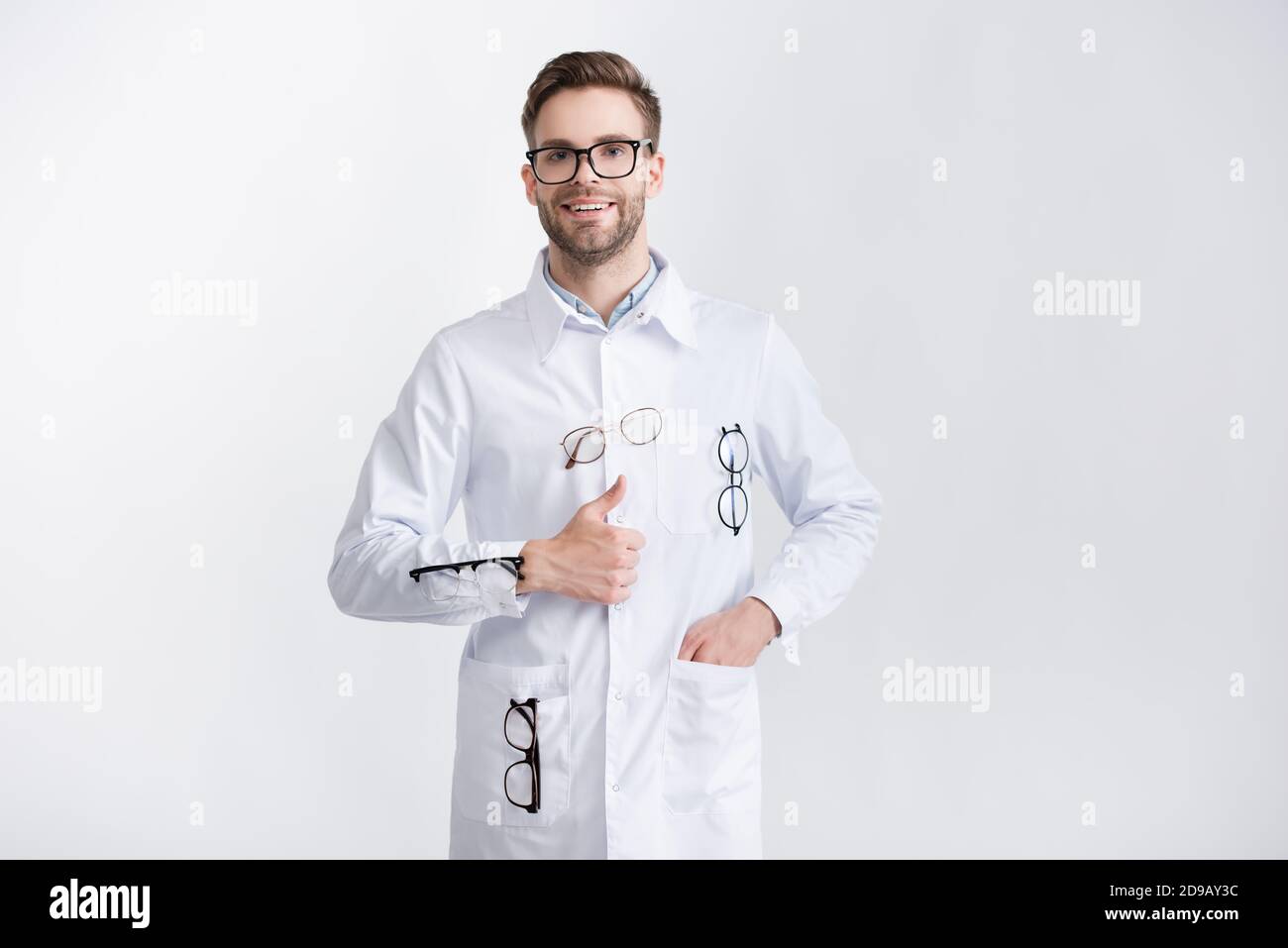 Doctor coat hanging hi-res stock photography and images - Alamy