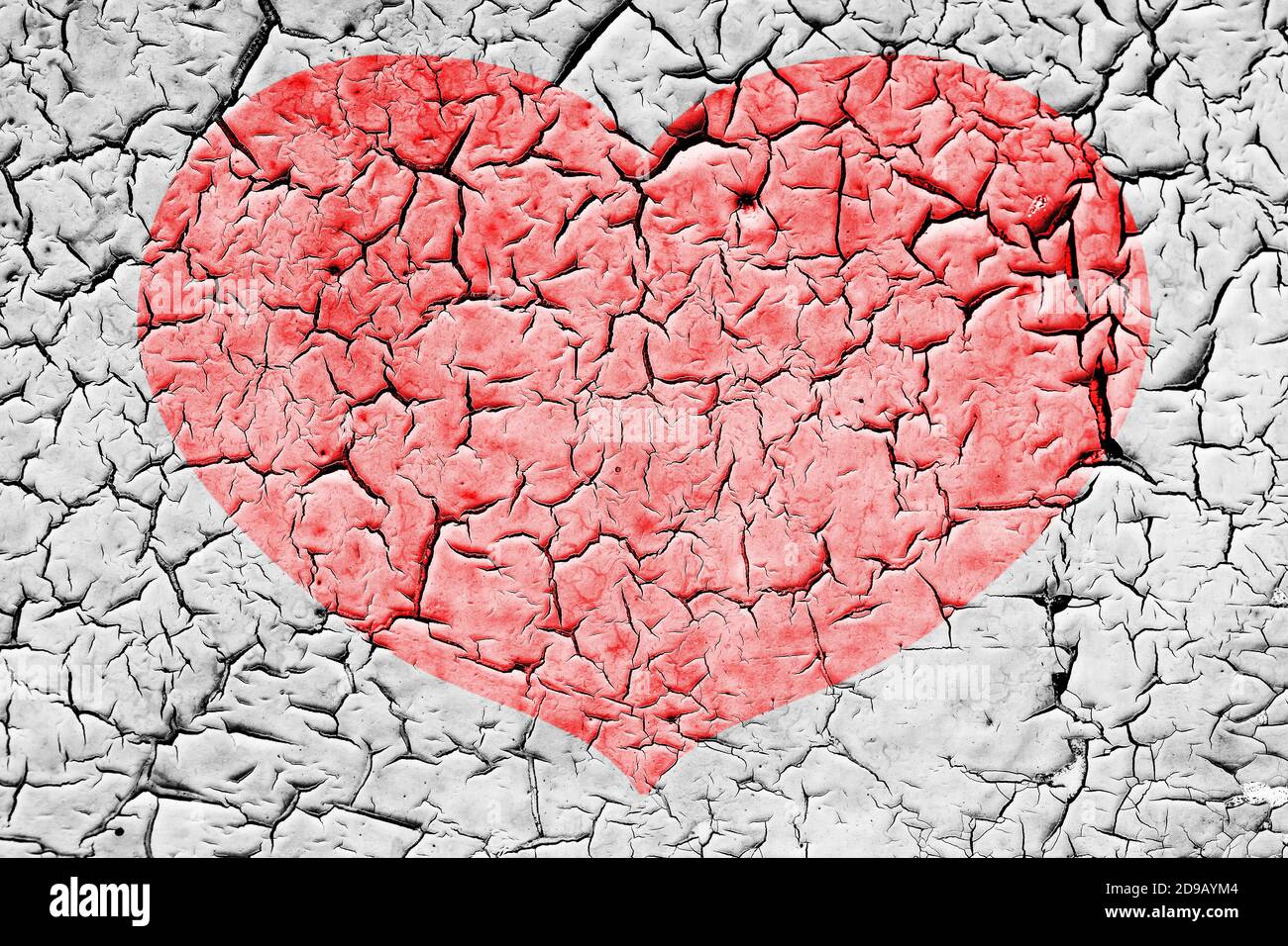 Red heart on a cracked texture. The concept of broken heart, end of ...