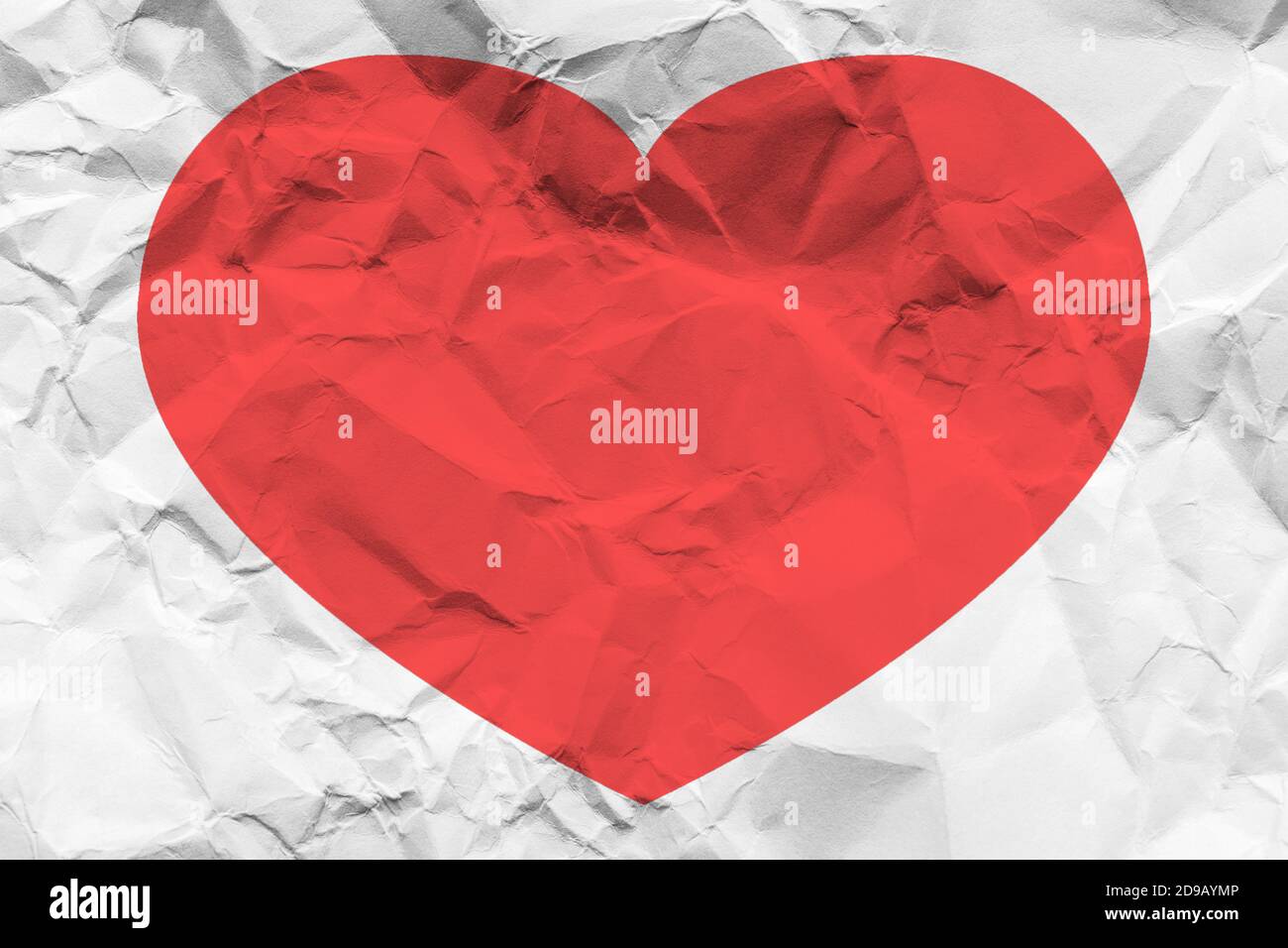 Red heart on a crumpled texture. The concept of broken heart, end of ...