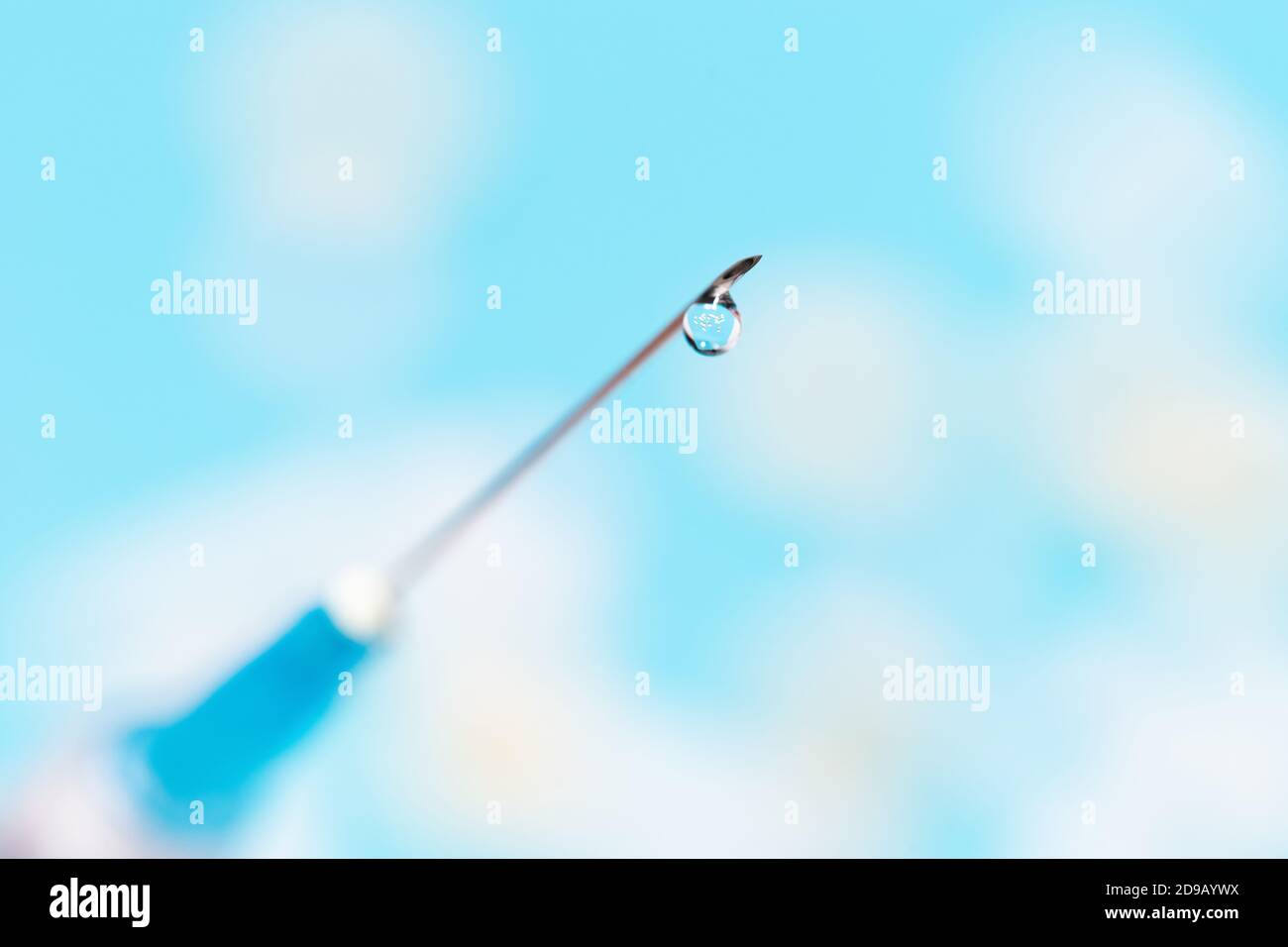 close up. drop of medicine on the needle of a syringe Stock Photo - Alamy