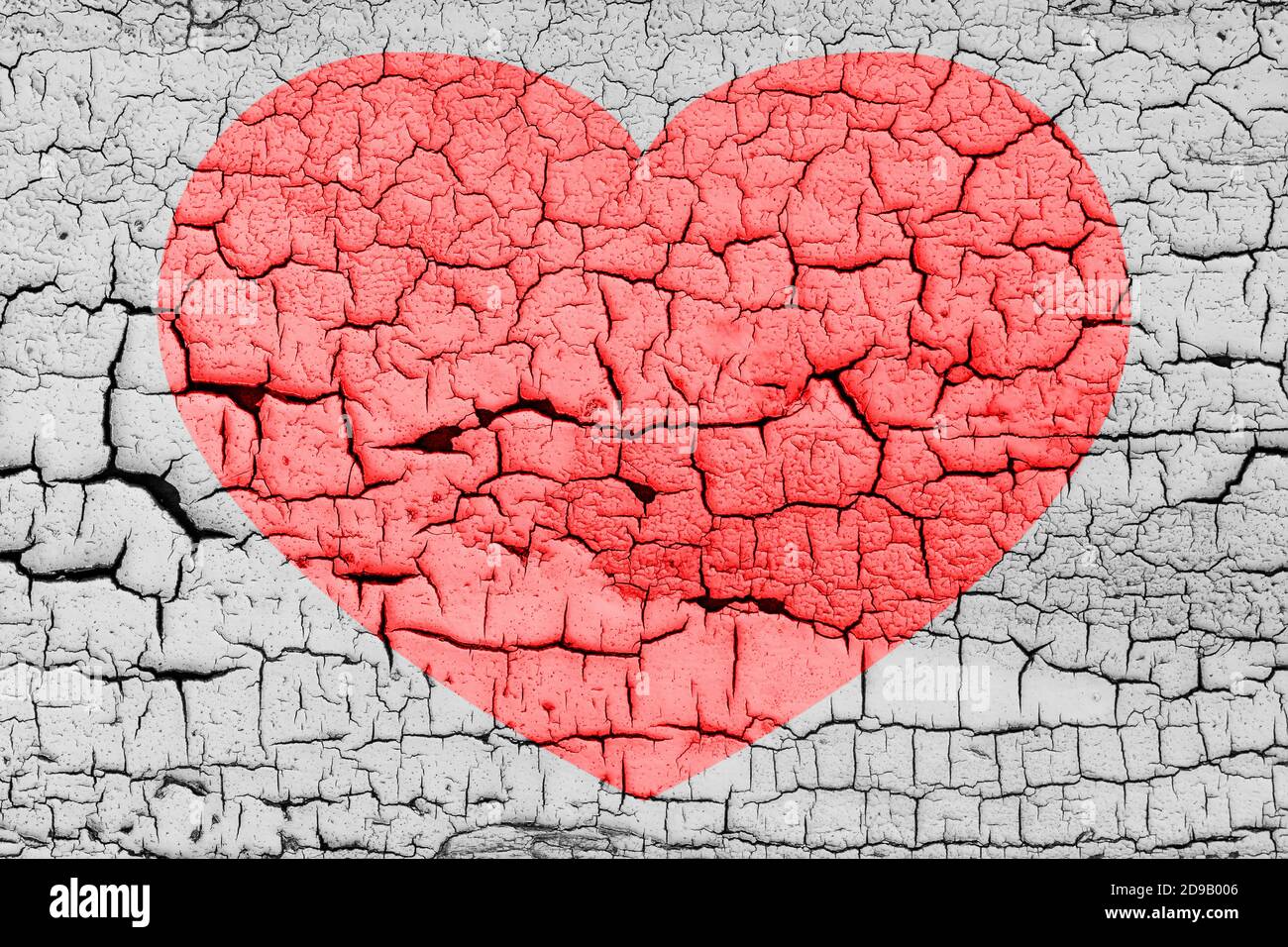 Red heart on a cracked texture. The concept of broken heart, end of ...