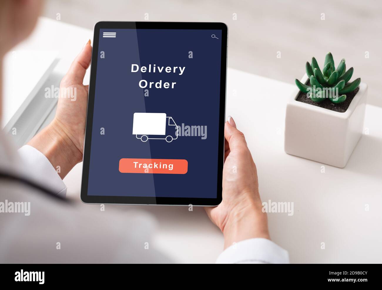 Delivery order, button and truck on digital screen of tablet. Business ...