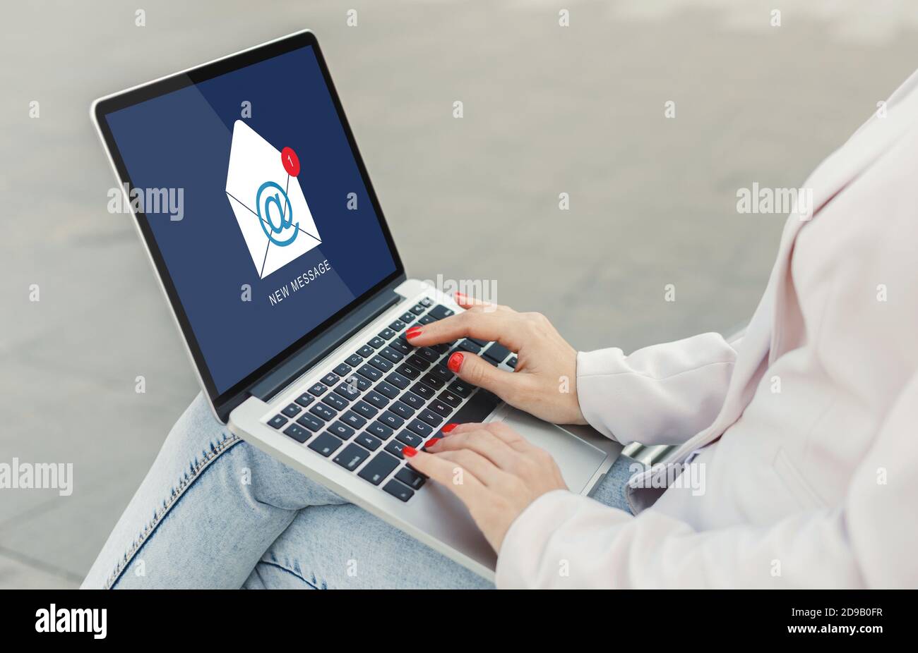 Businesswoman With Laptop Reading E-Mail Message Communicating Online ...