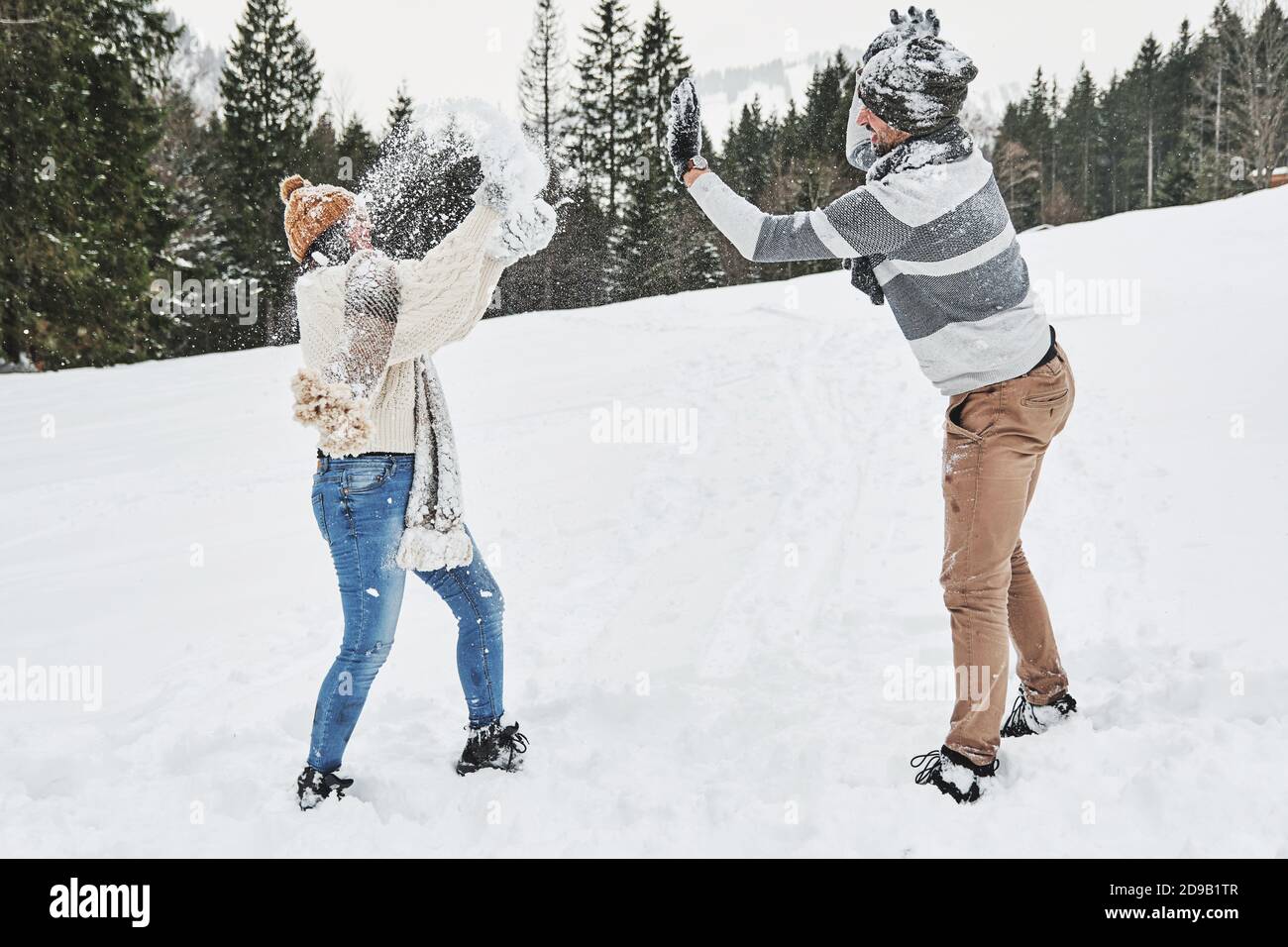 Snowball fight winter holiday hi-res stock photography and images - Alamy
