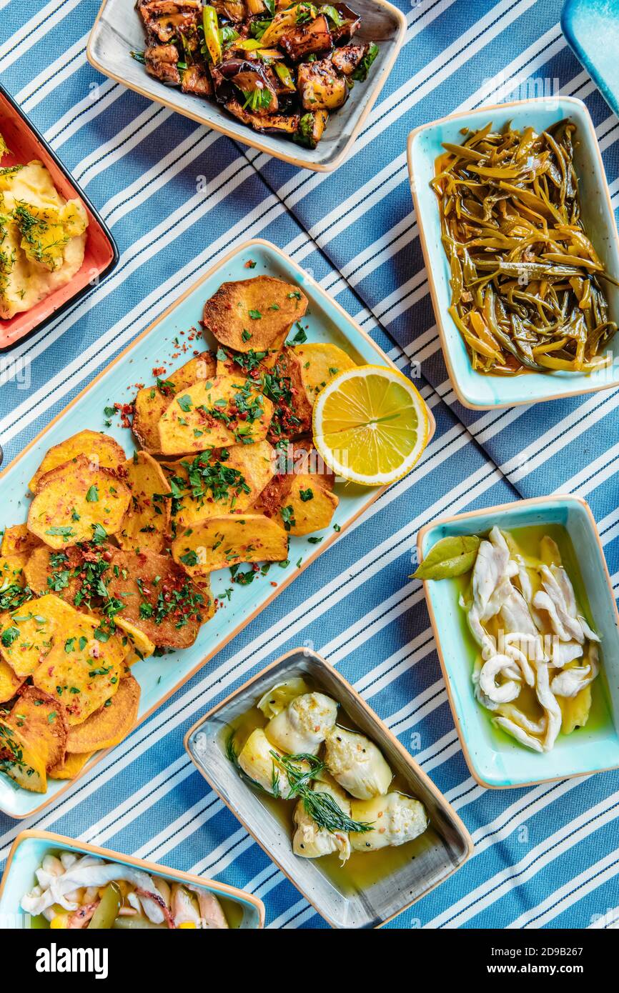 Seafoods, grilled meat, meze, herbs, fish, raki, ouzo, appetizers and ...