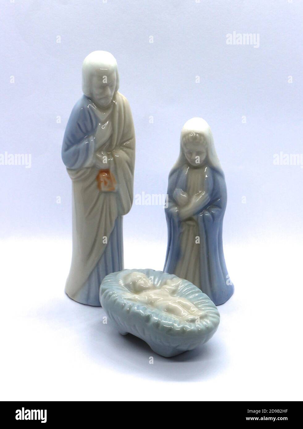 Porcelain nativity scene in pale blue and cream colours against a white ...