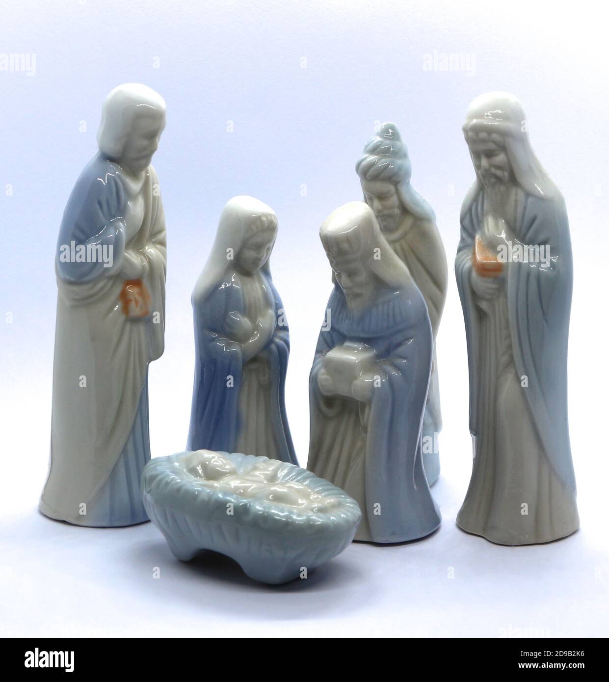 Porcelain nativity scene in pale blue and cream colours against a white ...