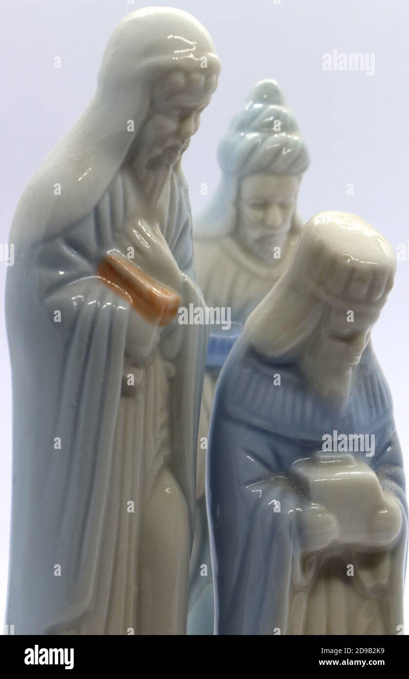 Porcelain nativity scene in pale blue and cream colours against a white ...