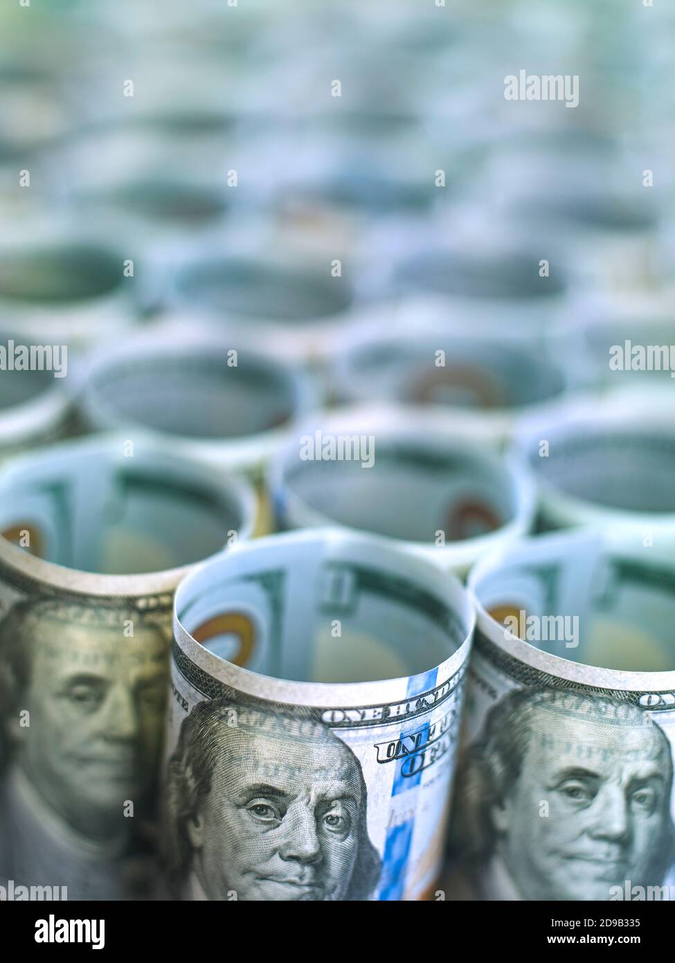 100 dollar bill rolled up hi-res stock photography and images - Alamy