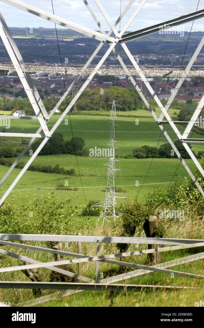 Power Line and pylons stretch across the Ayrshire Countryside, Scotland ...