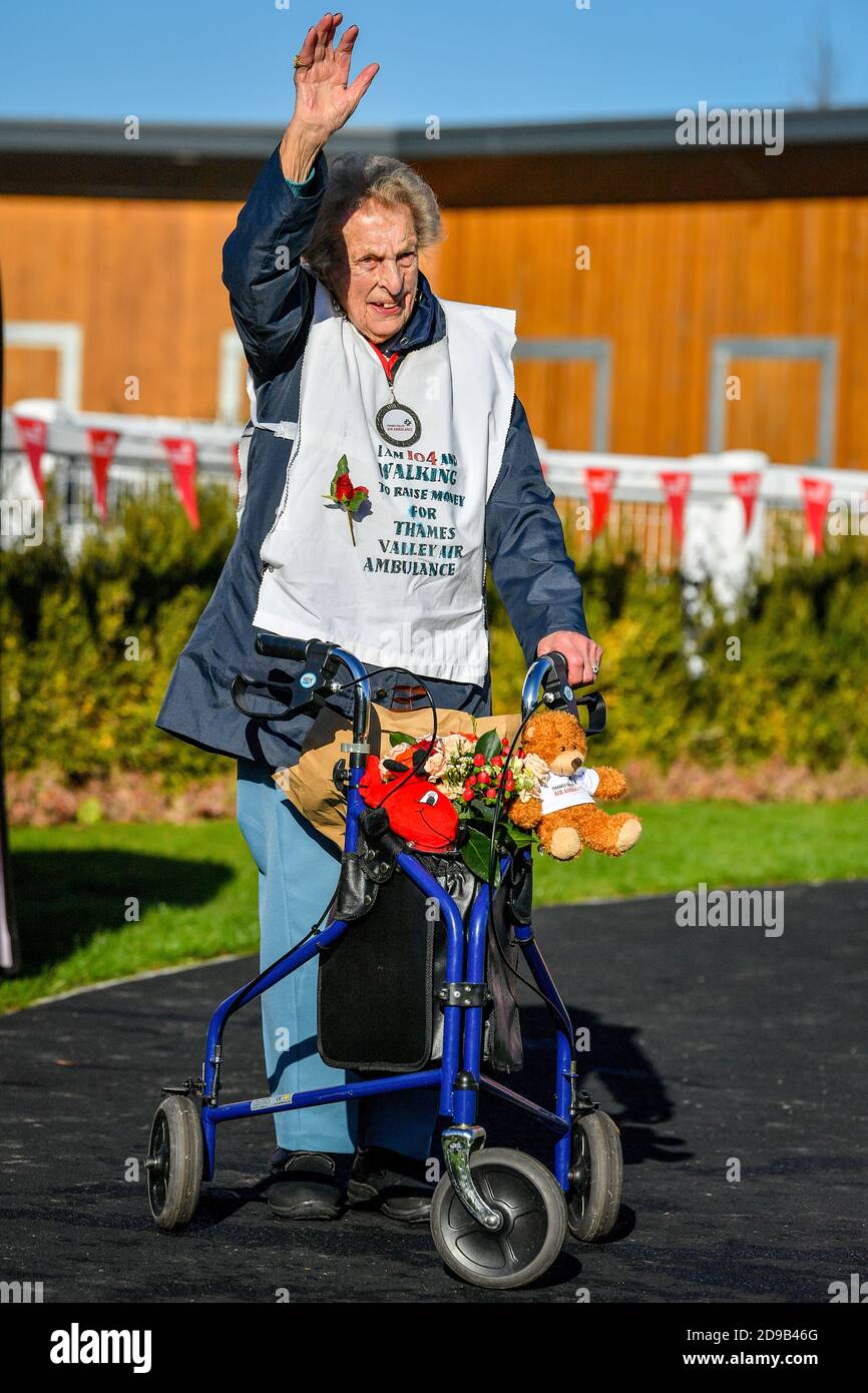 104-year-old Ruth Saunders celebrates as she crosses her finishing line ...