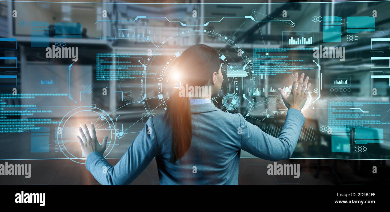 Modern business technologies. Female CEO operating virtual screen with ...