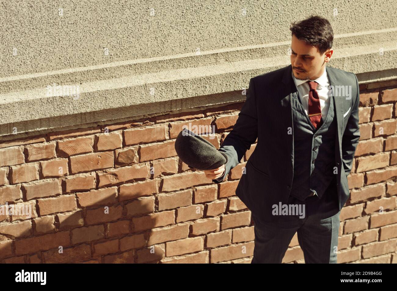 Portrait of retro 1920s english arabian business man wearing dark suit ...