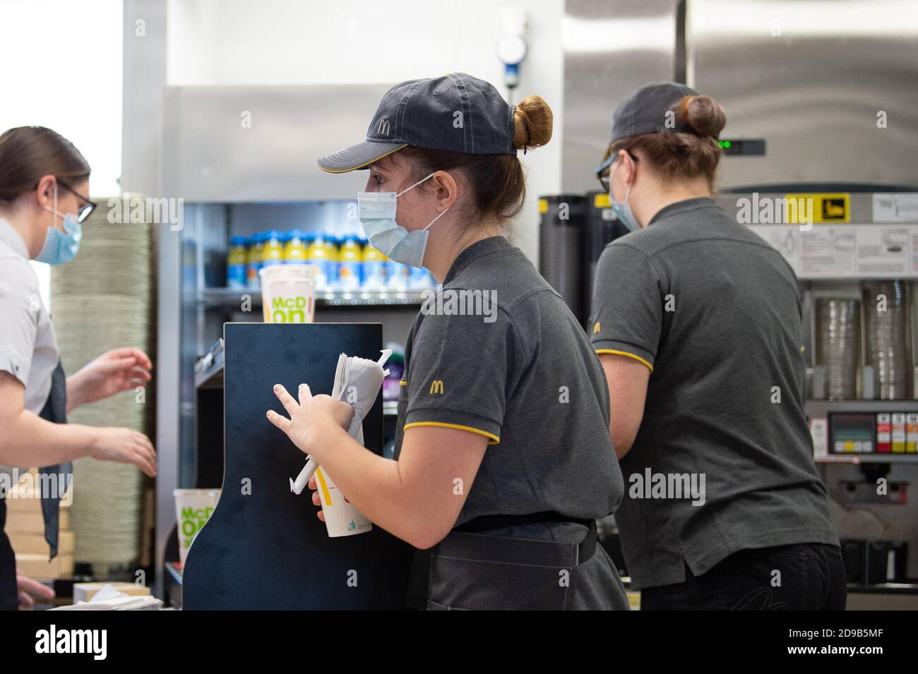 Staff in the kitchen of a new McDonald's restaurant, based on the ...
