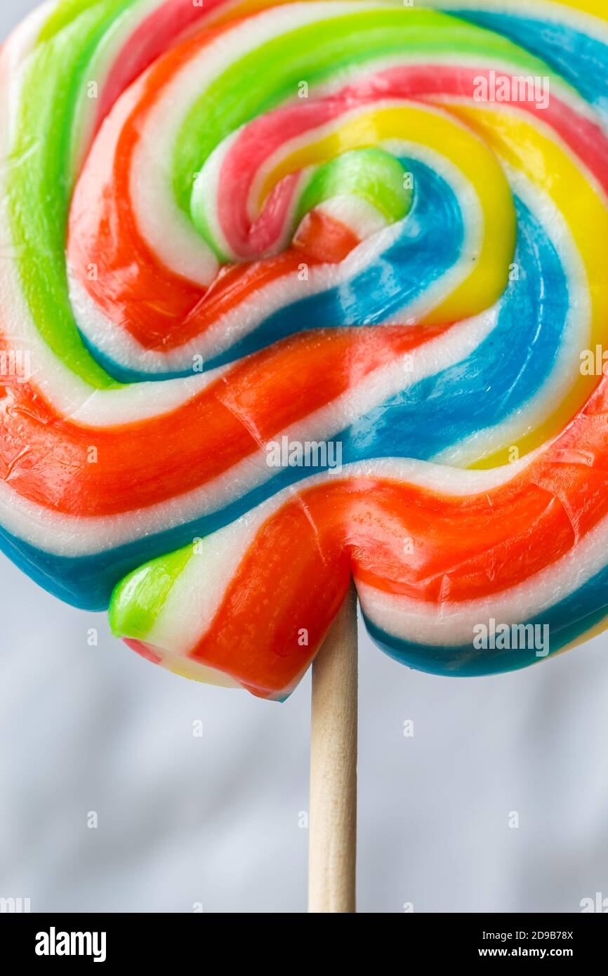 Large lolly pop candy multi coloured Stock Photo - Alamy