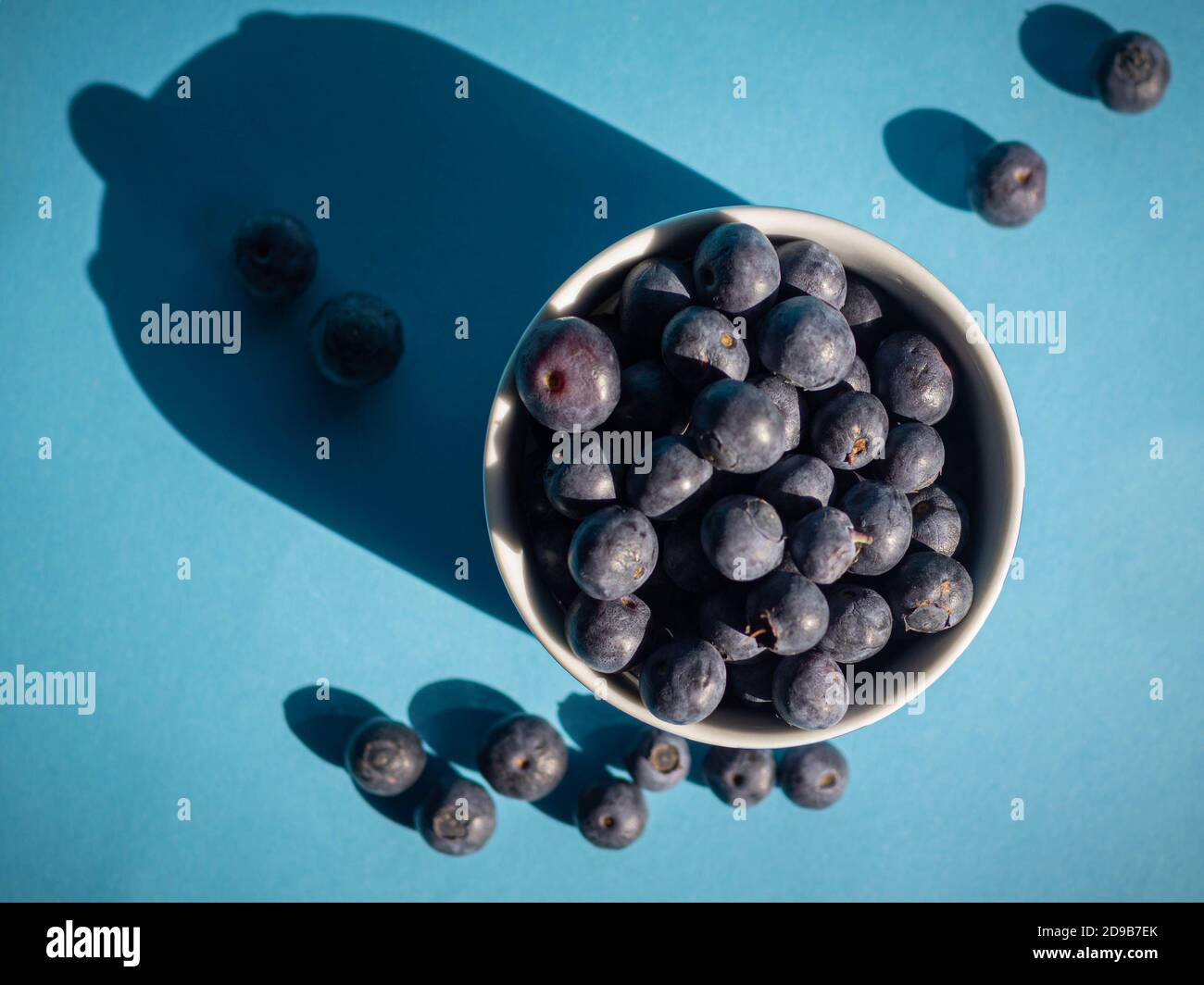 Blueberries in wooden cup hi-res stock photography and images - Alamy