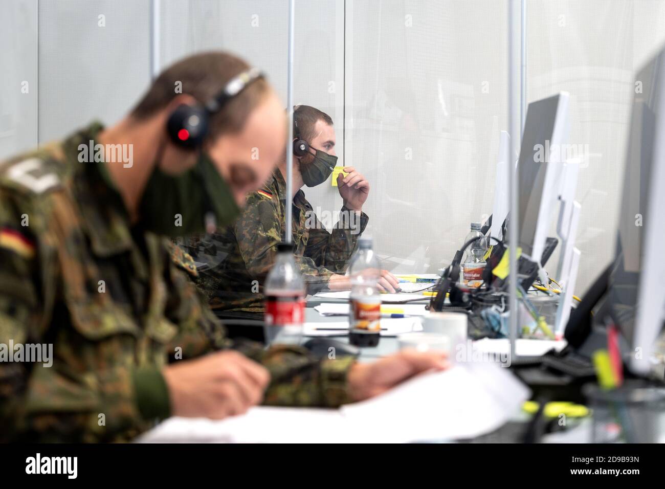 Karlsruhe, Germany. 04th Nov, 2020. Soldiers make a phone call in a ...