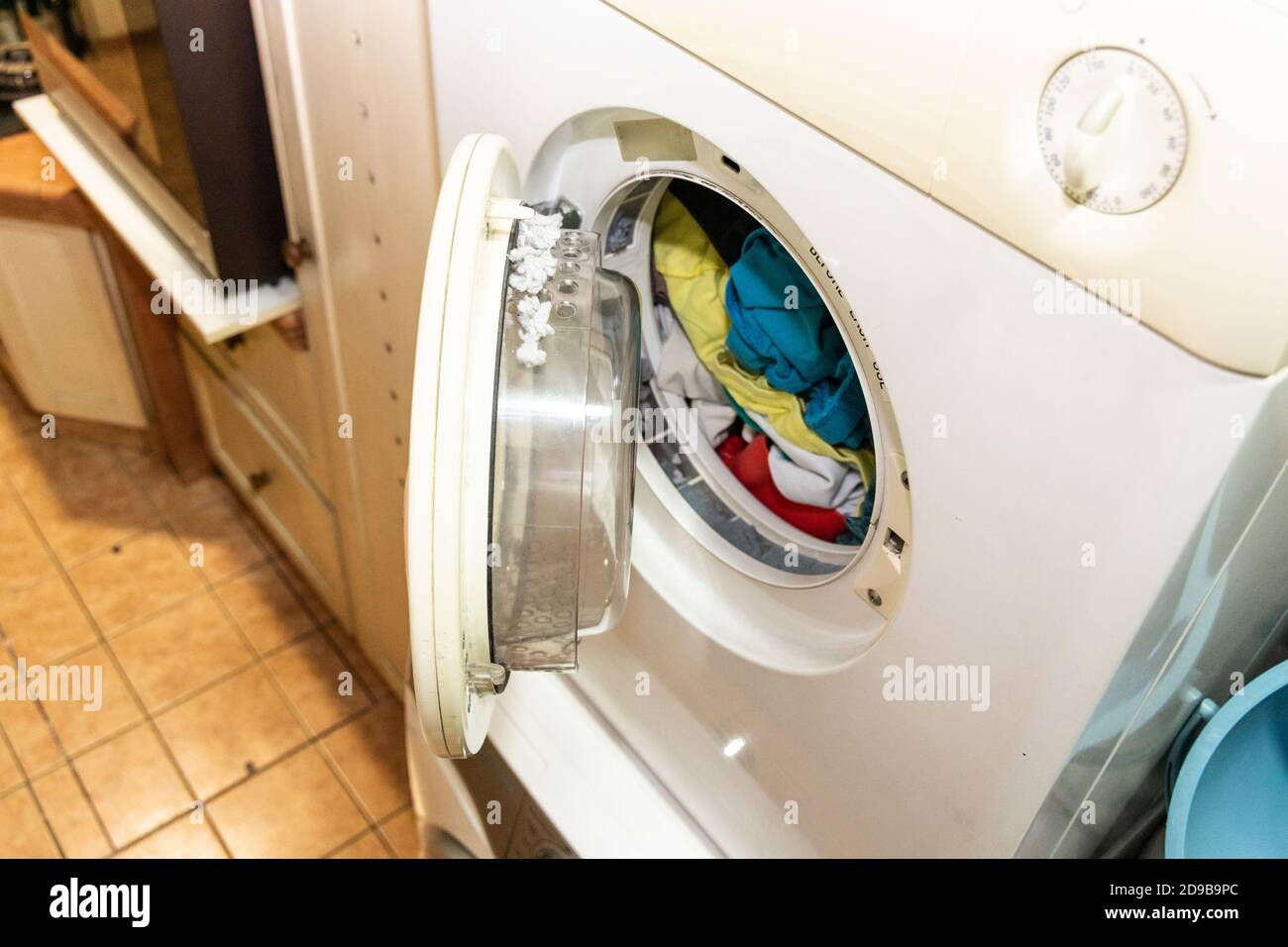 Lint trapped in filter of laundry dryer machine after drying Stock ...