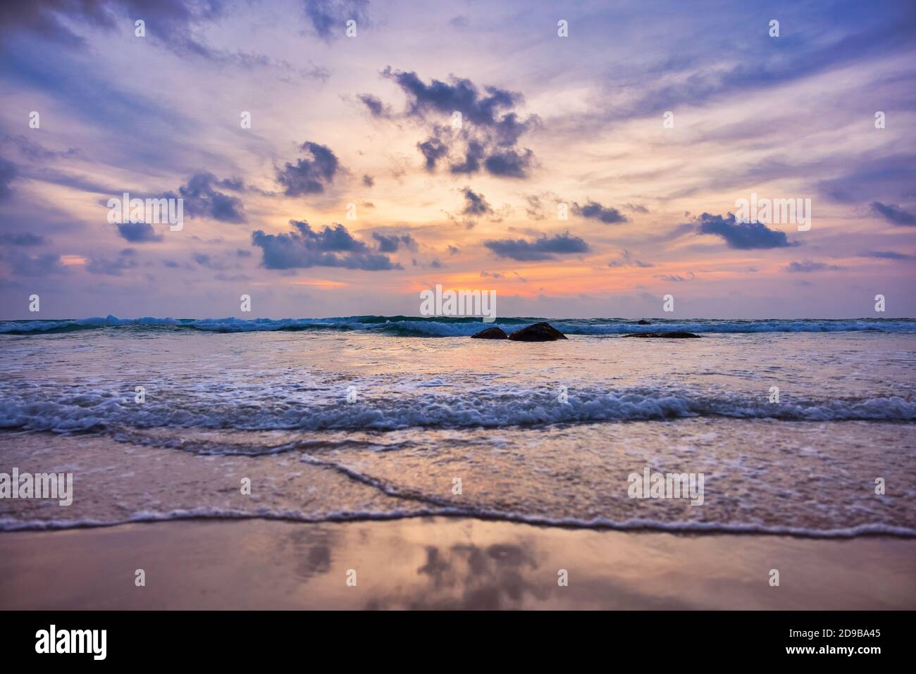 Colorful cloudy sunset beach hi-res stock photography and images - Alamy