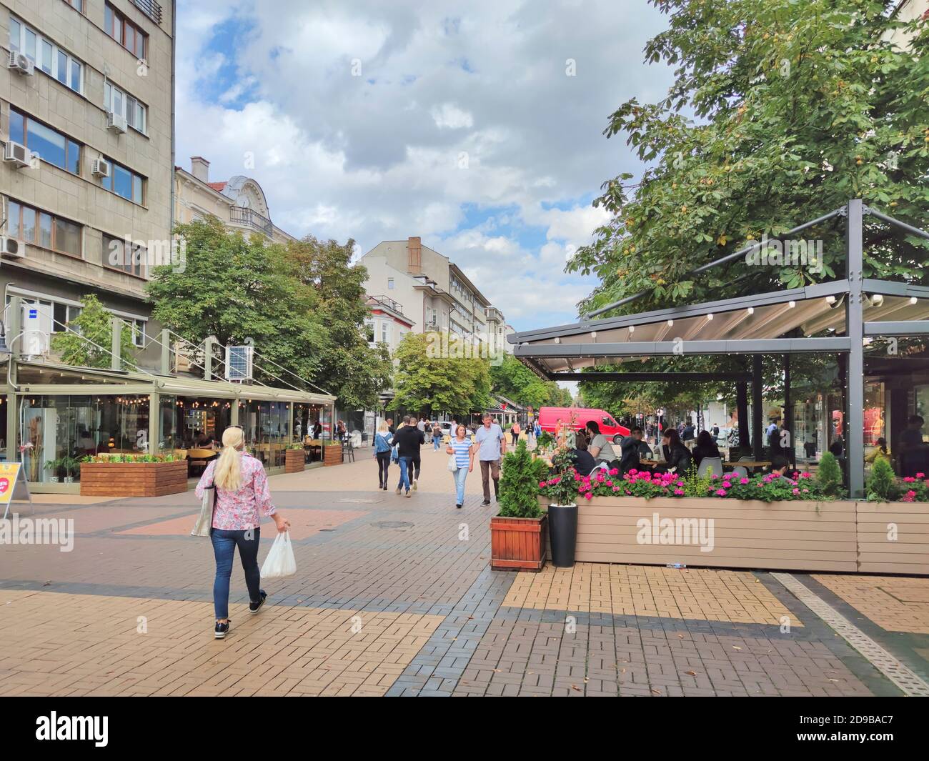 SOFIA, BULGARIA -SEPTEMBER 26, 2020: Walking people on Boulevard Vitosha in city of Sofia ...