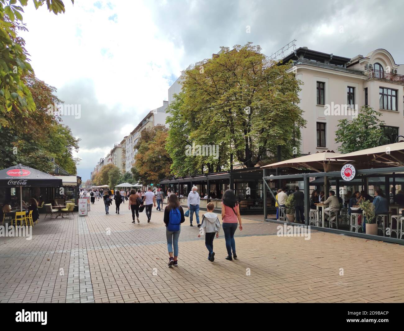 SOFIA, BULGARIA -SEPTEMBER 26, 2020: Walking people on Boulevard Vitosha in city of Sofia ...