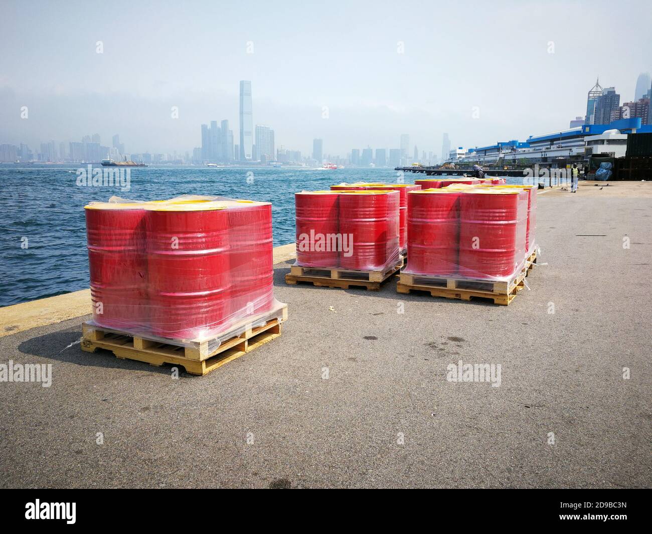Red barrel of goods over pallets in Water front at Western District ...