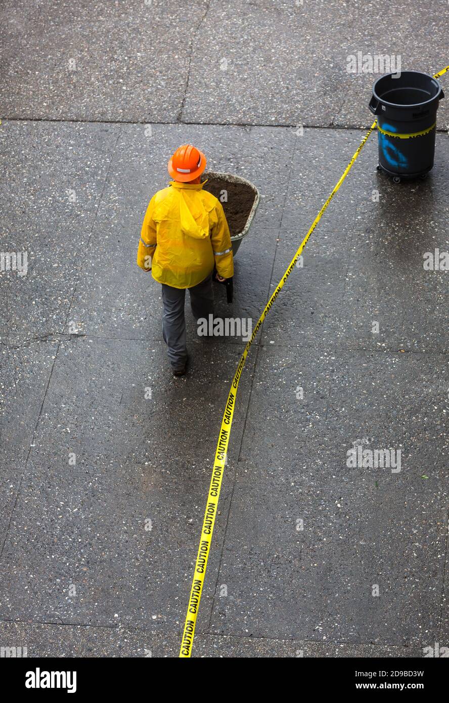 NEW YORK, USA - May 03, 2016: Construction worker in a yellow ...
