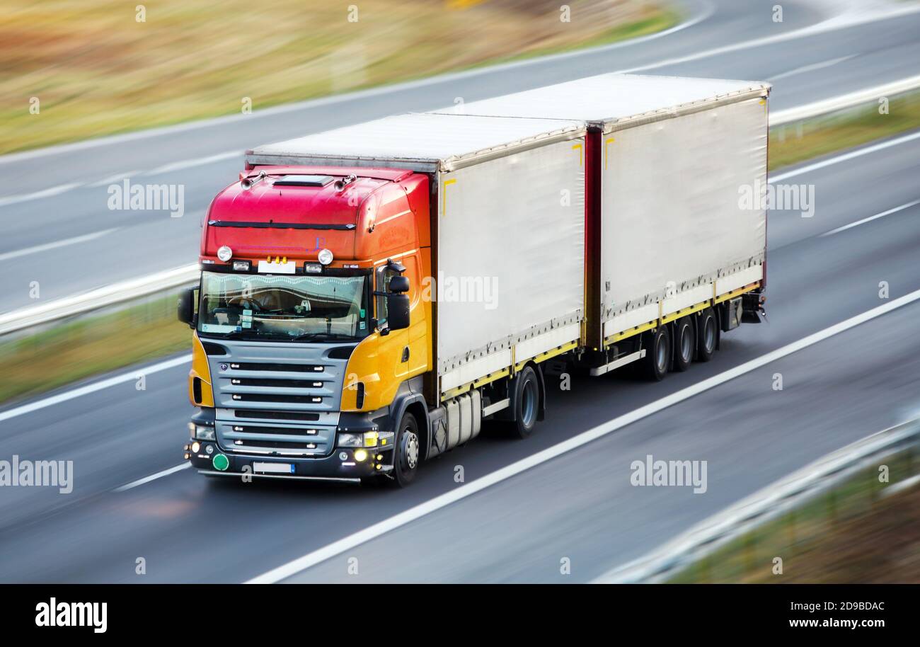 Container truck on the road hi-res stock photography and images - Alamy