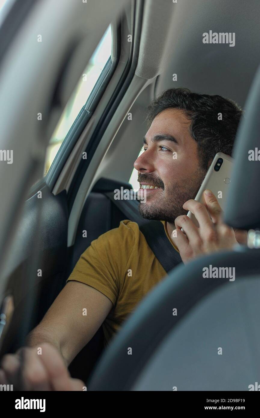 Boy passenger phone car hi-res stock photography and images - Alamy