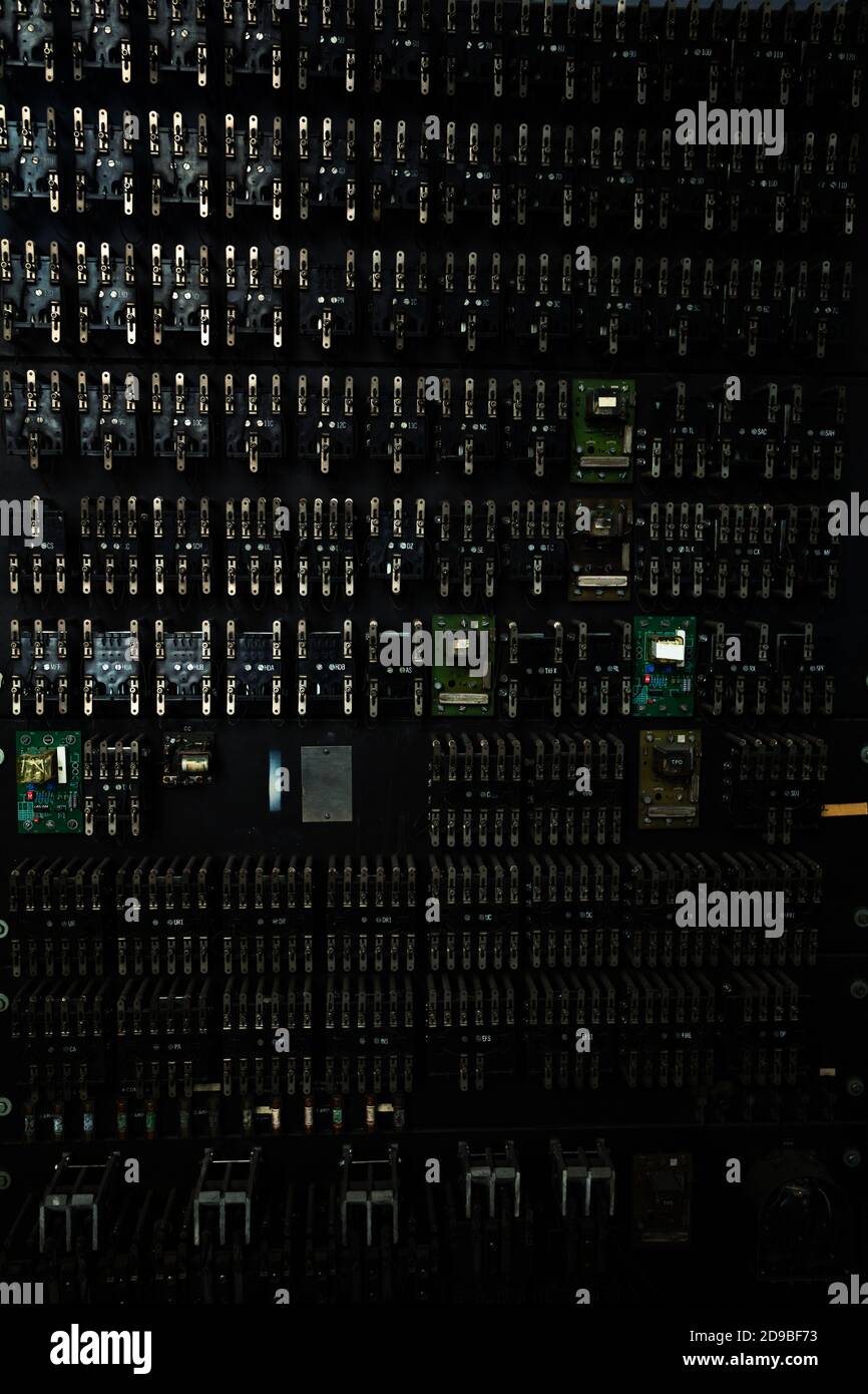 Close-up of an old telephone control panel with tumblers and switches ...