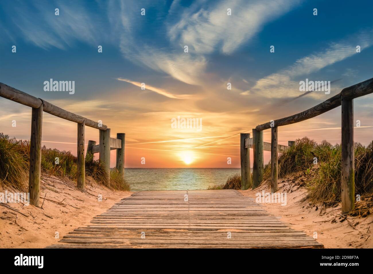 Beachside pathway leading to the ocean with spectacular sunrise Stock ...
