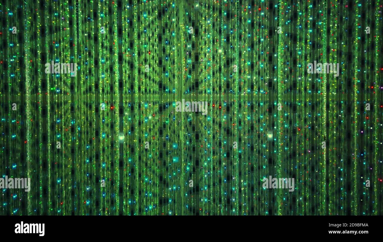 Green background of LED flashing, blinking and flickering bulbs. Disco ...