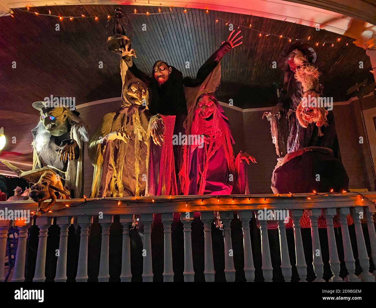 Scary Halloween installation on the porch of a large victorian house in ...